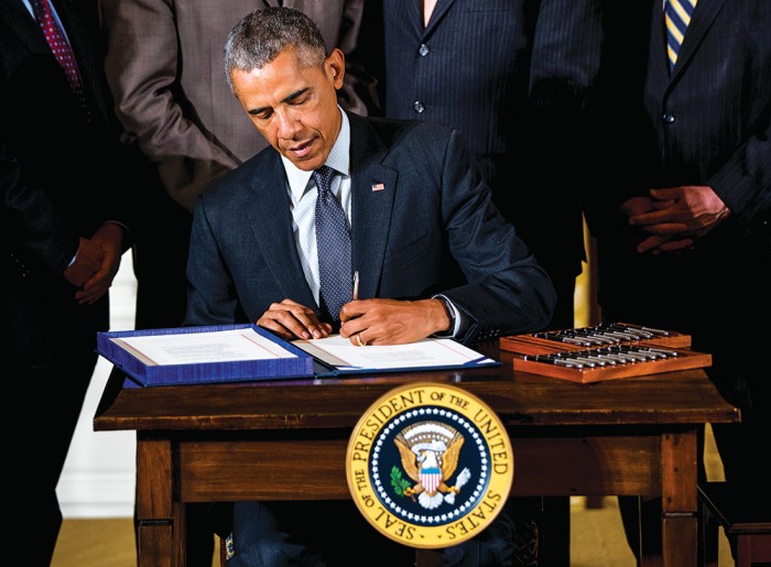 Obama-Signs-Trade-Bill