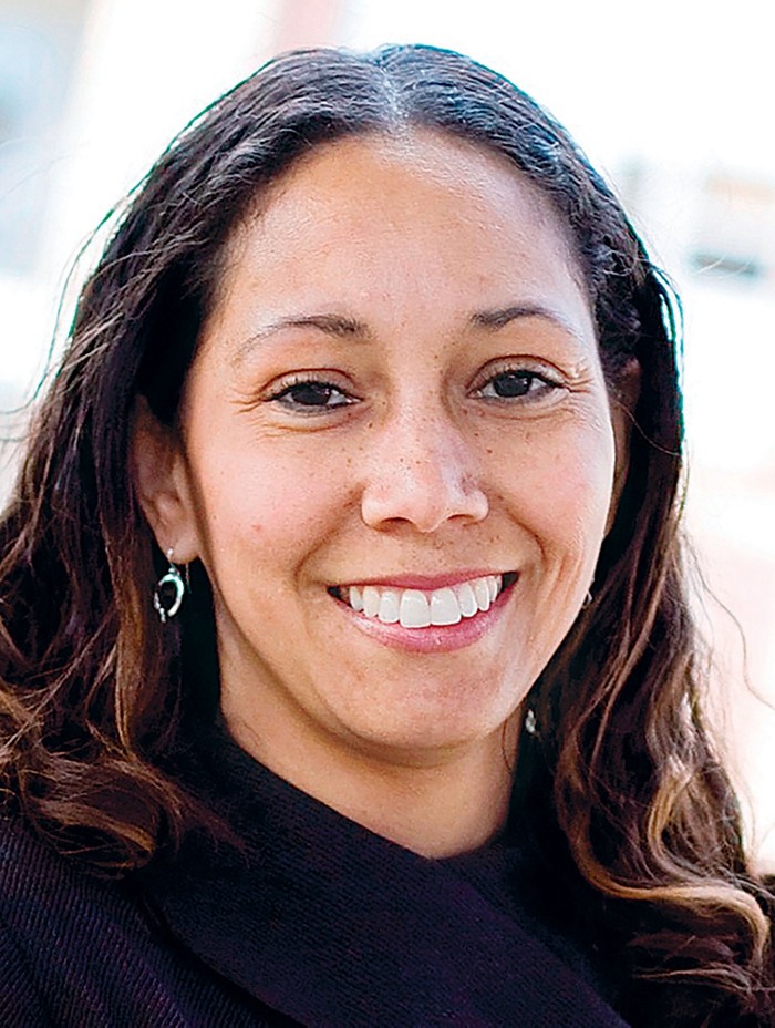 For director-at-large: Angela W. Peters