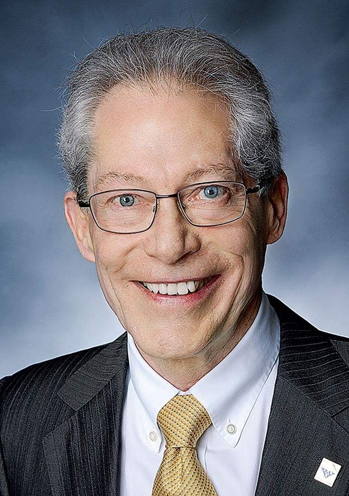 For District V director: John E. Adams