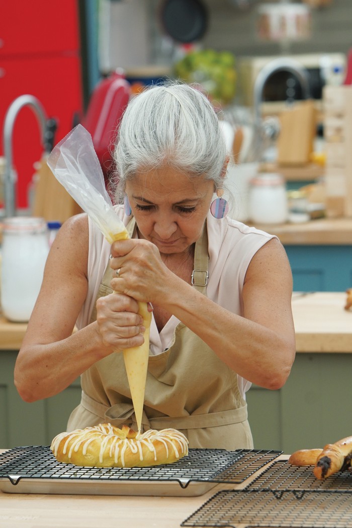 A chemist enters a popular TV baking competition, and a cat food discovery