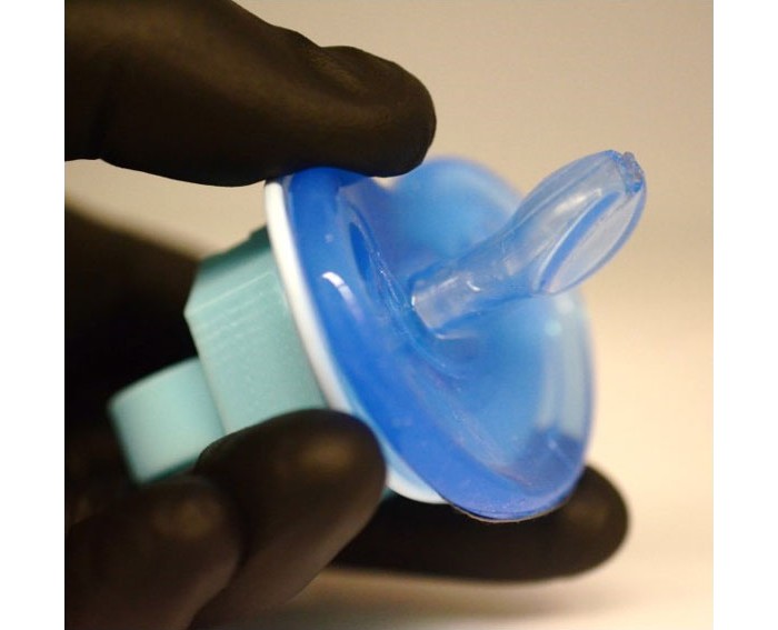 Engineered pacifier measures glucose in saliva