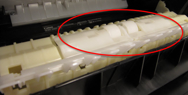 Make sure the paper path guide is properly seated