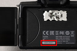 How to find the serial number location on a Canon EOS Digital Camera