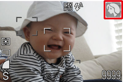 Setting the camera to Portrait mode using the PowerShot SD940 IS.