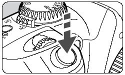 How to operate the 2 step shutter button on the EOS Digital Rebel XTi.