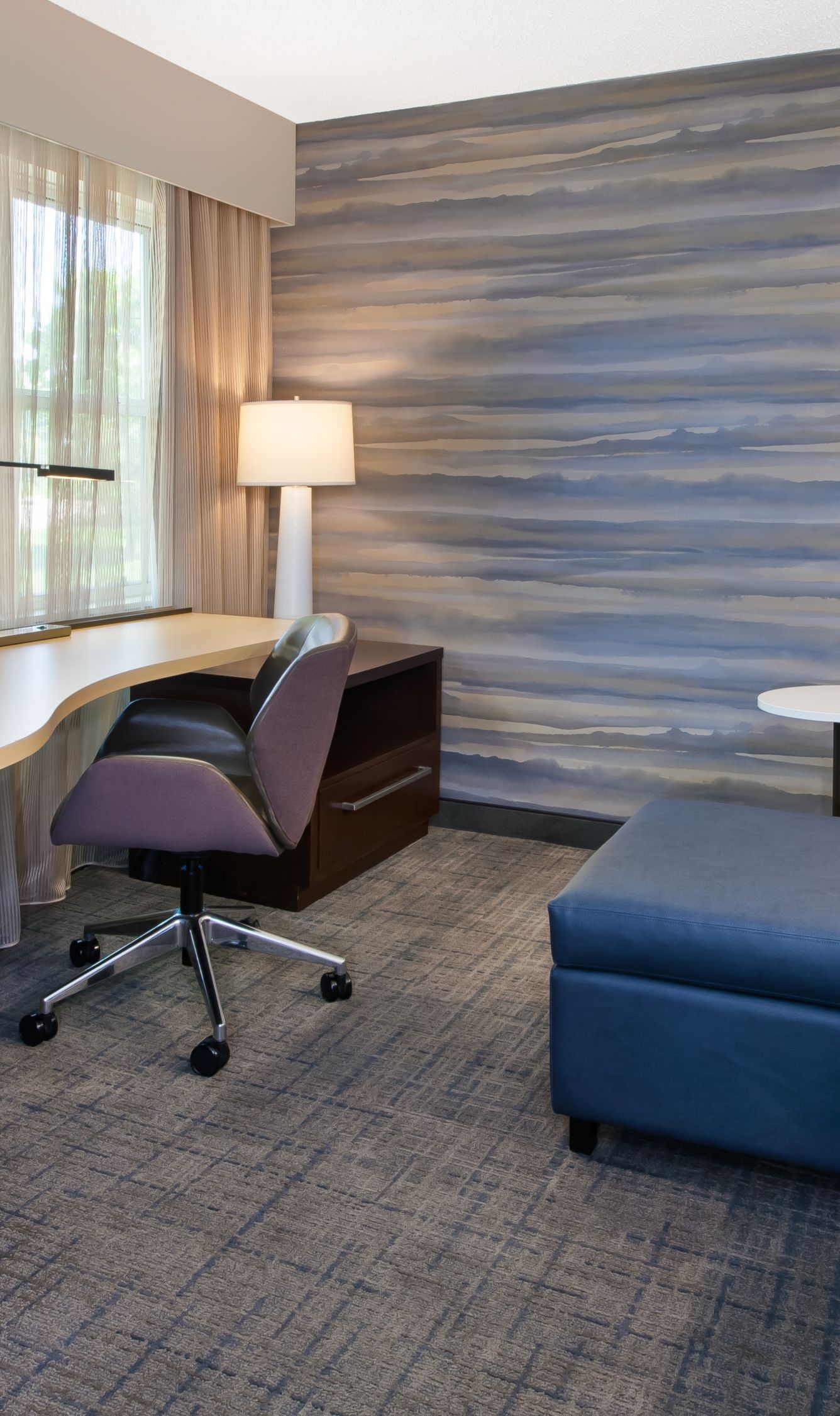 Studio Suite living room with sleeper sofa