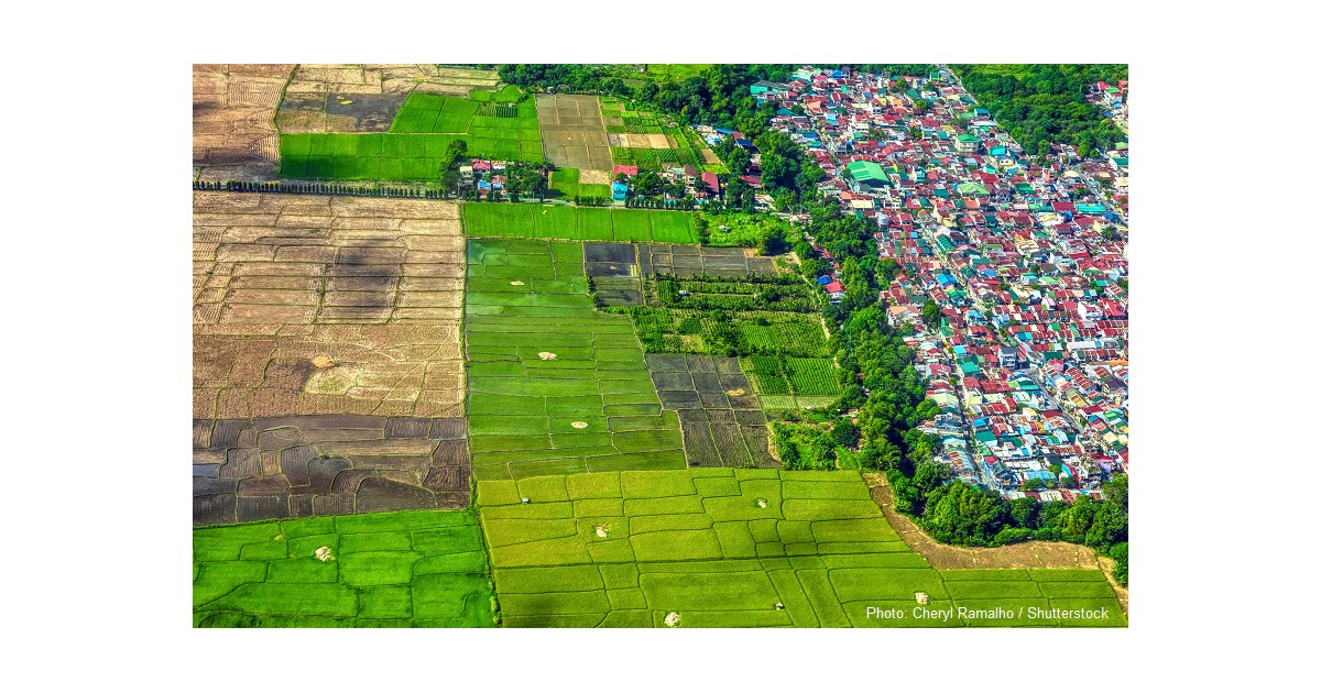 How do we define cities, towns, and rural areas?